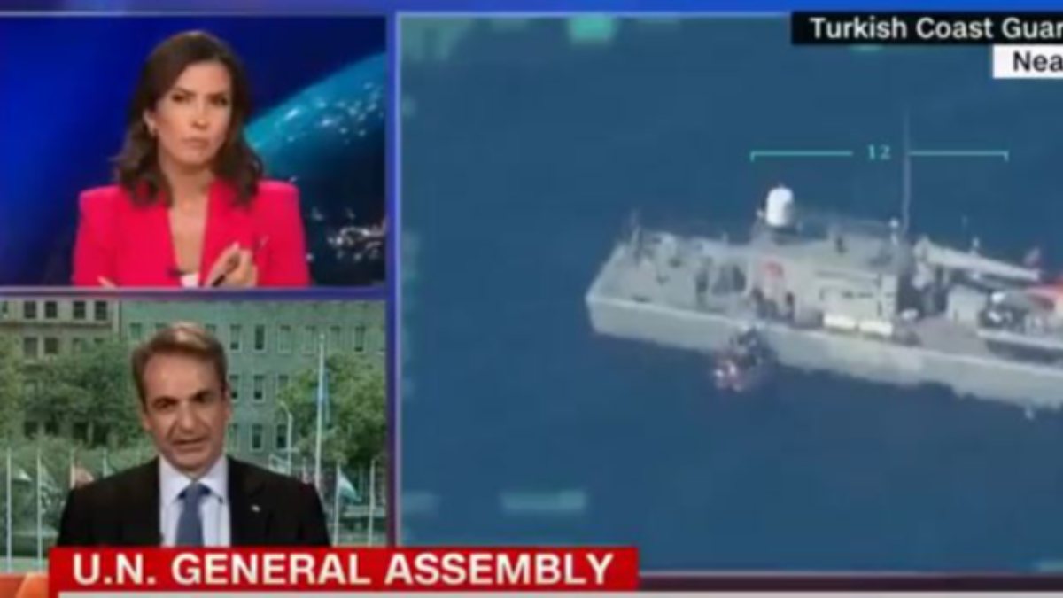 CNN, Kiryakos Miçotakis konuşurken geri itilen göçmenleri gösterdi